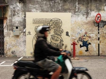 Person-on-a-bike-in-penang - Master Divers Koh Tao